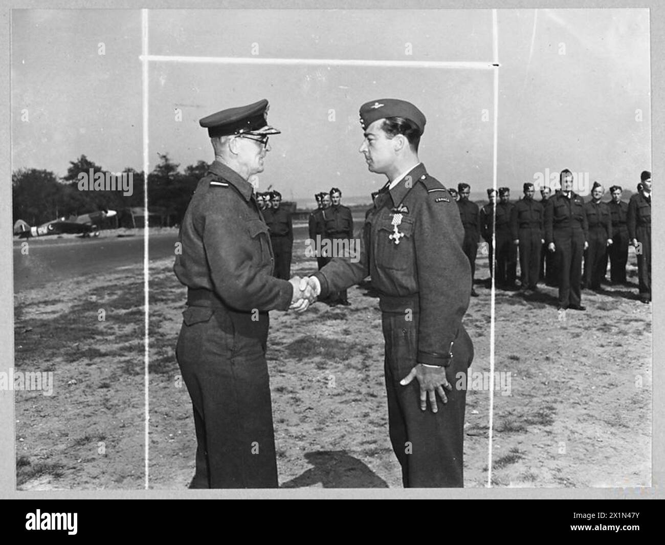 FRENCH SPITFIRE PILOT AWARDED THE D.F.C. - 26 year old LIEUTENANT JACOT ...