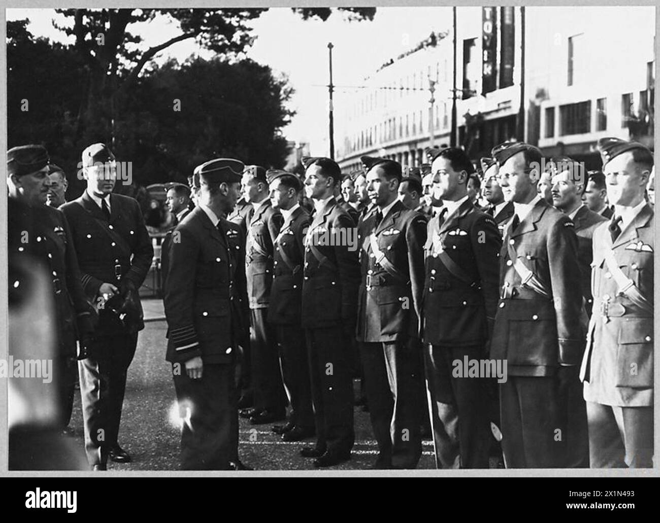 The King and Queen inspect Dominion and American personnel, including ...