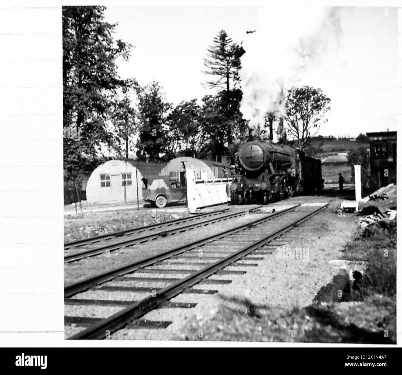 SPECIAL ASSIGNMENT FOR TN. 5 - Train passing over "Belmore" level ...