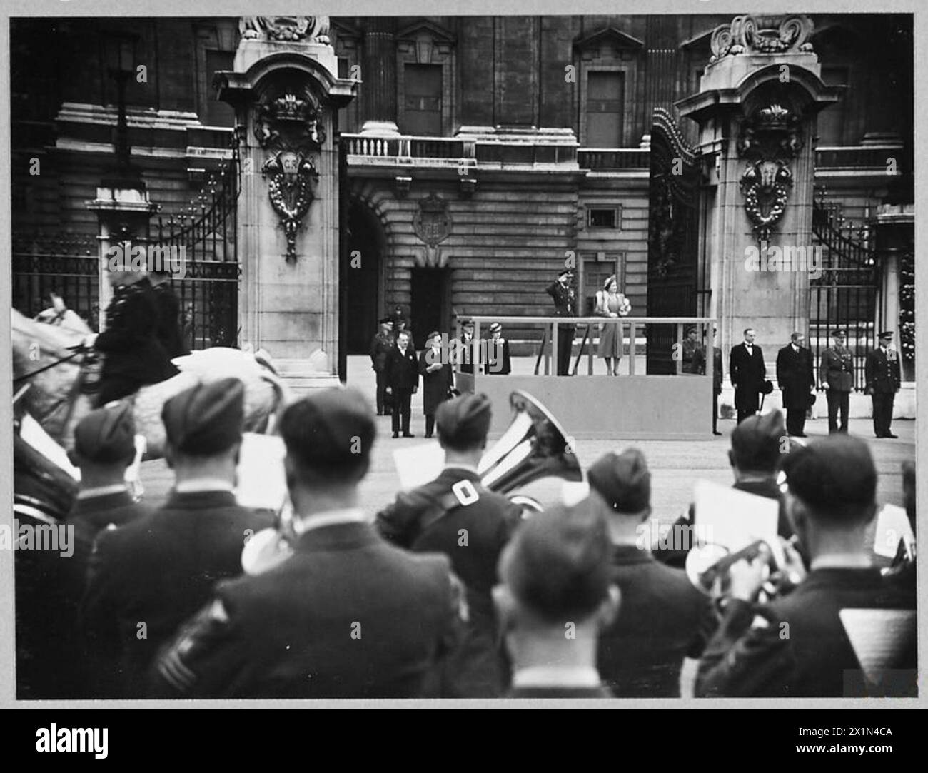 The King and Queen watch Dominion aircrews march past at Buckingham ...