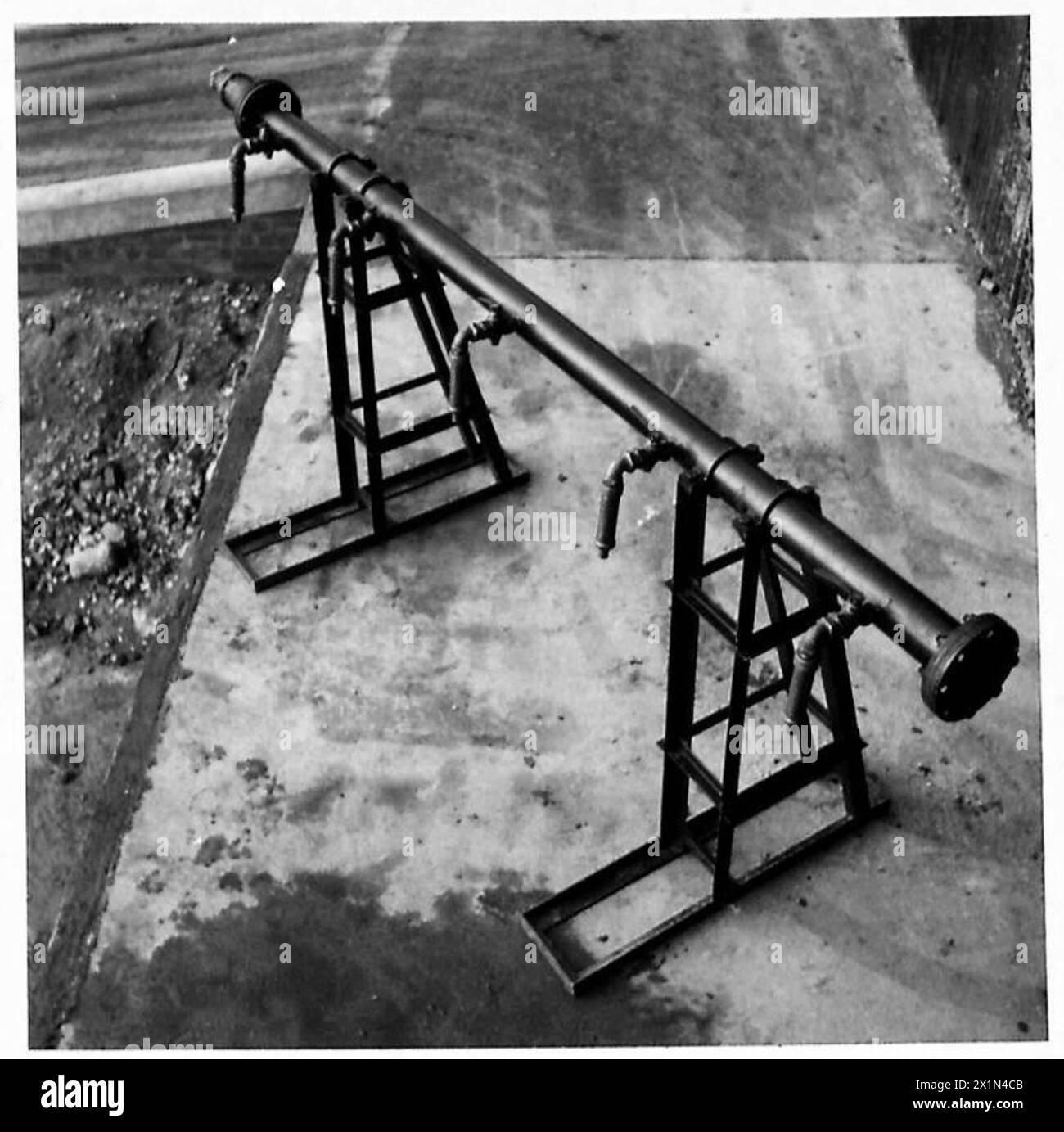 Petrol tanks are filled using standard can headers with telescopic ...