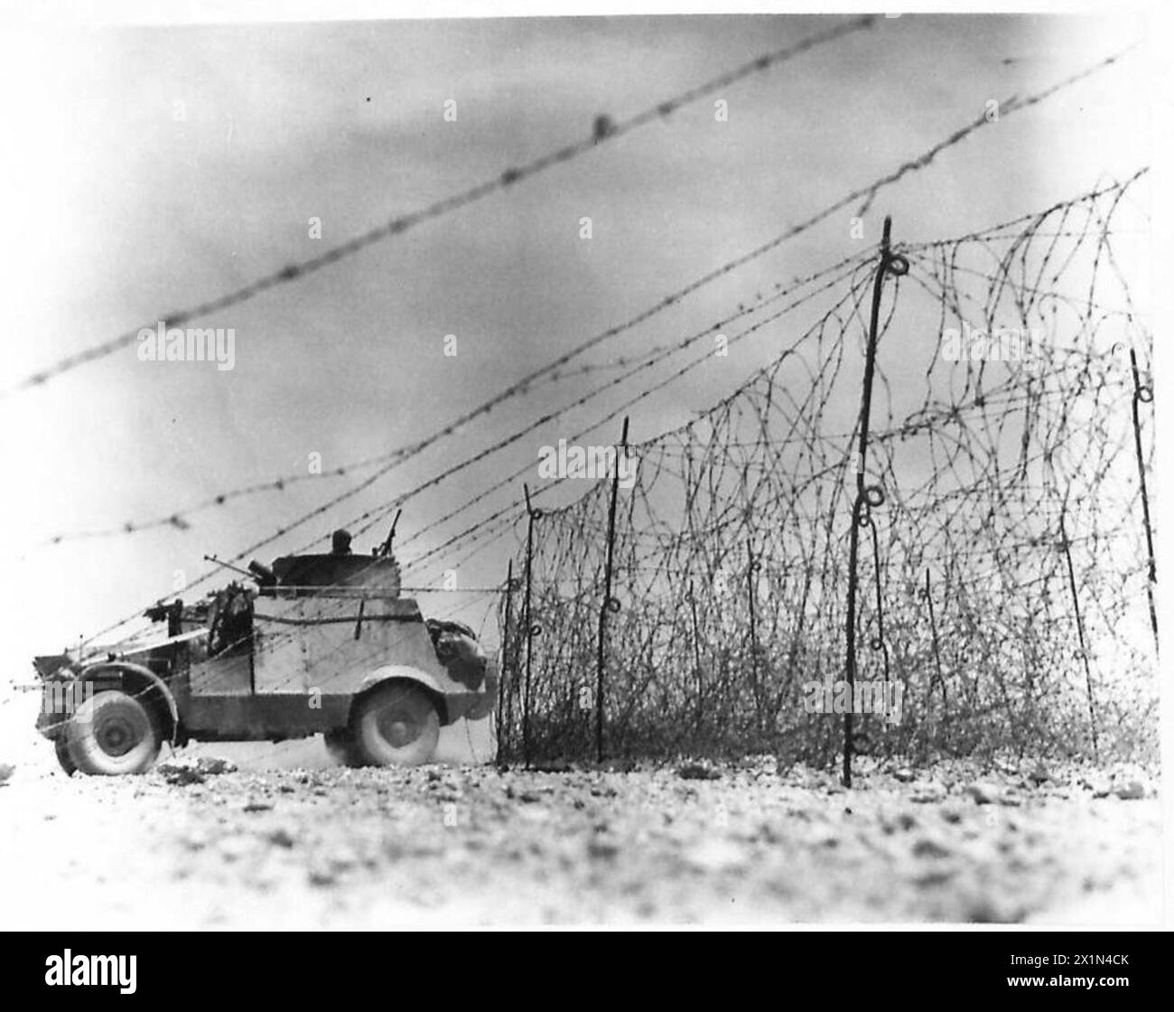 ACTIVITY IN THE WESTERN DESERT - An armoured car passing through ...