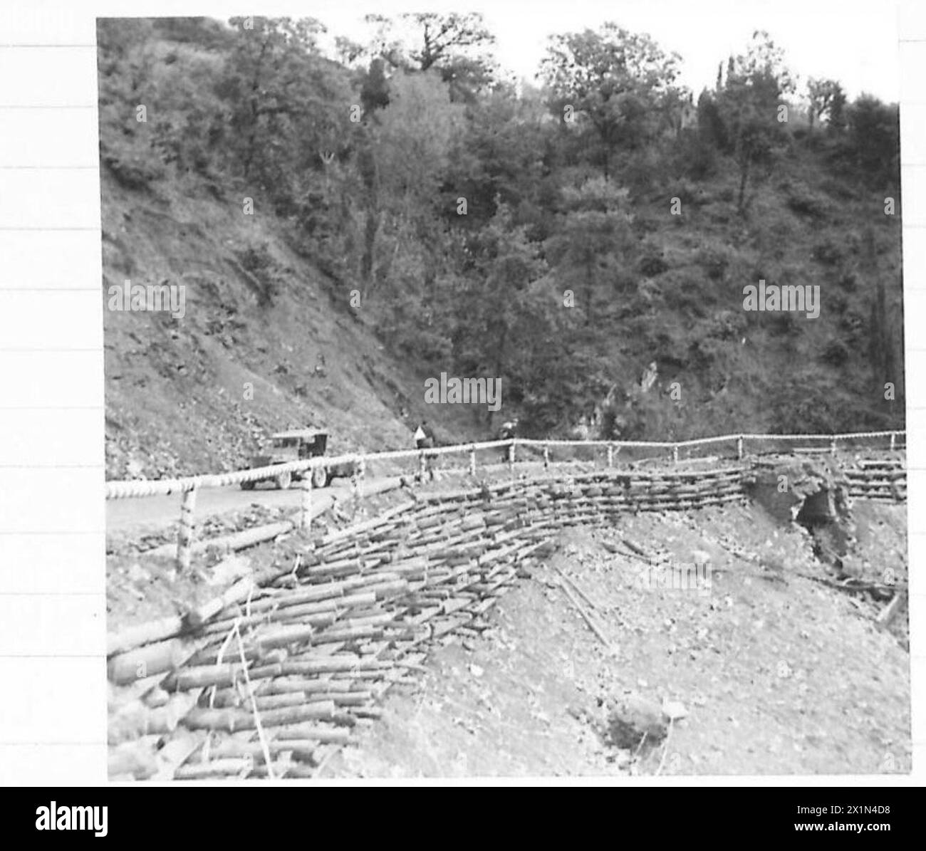 GERMAN DEMOLITIONS IN ITALY - Two views of timber cribbing on Route 67 ...