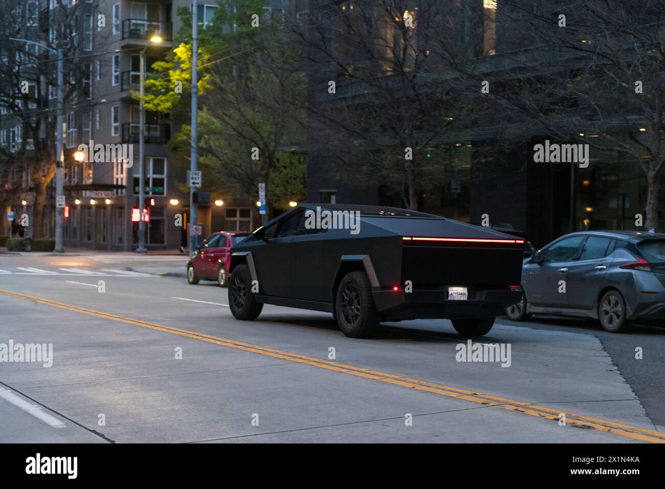 Seattle, USA. 15 Apr, 2024. A matte black wrapped Tesla Cybertruck on ...