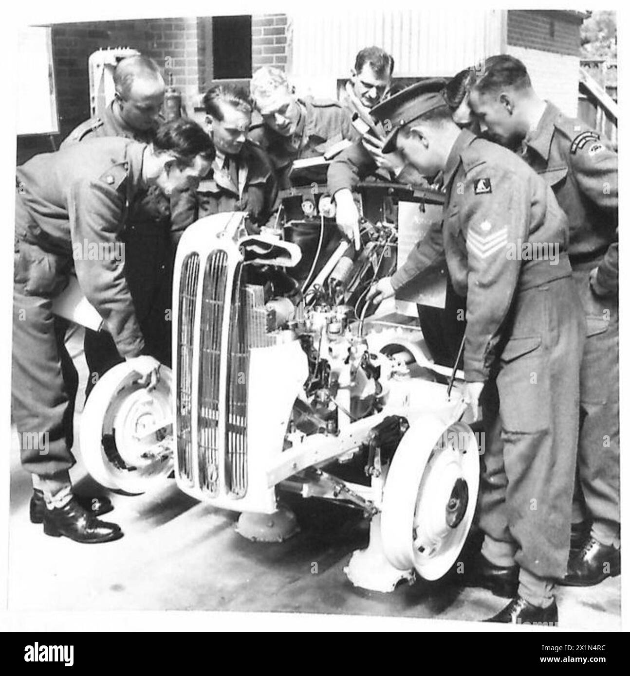 JUNIOR ARMY OFFICERS IN TRAINING - Instruction in vehicle maintenance ...