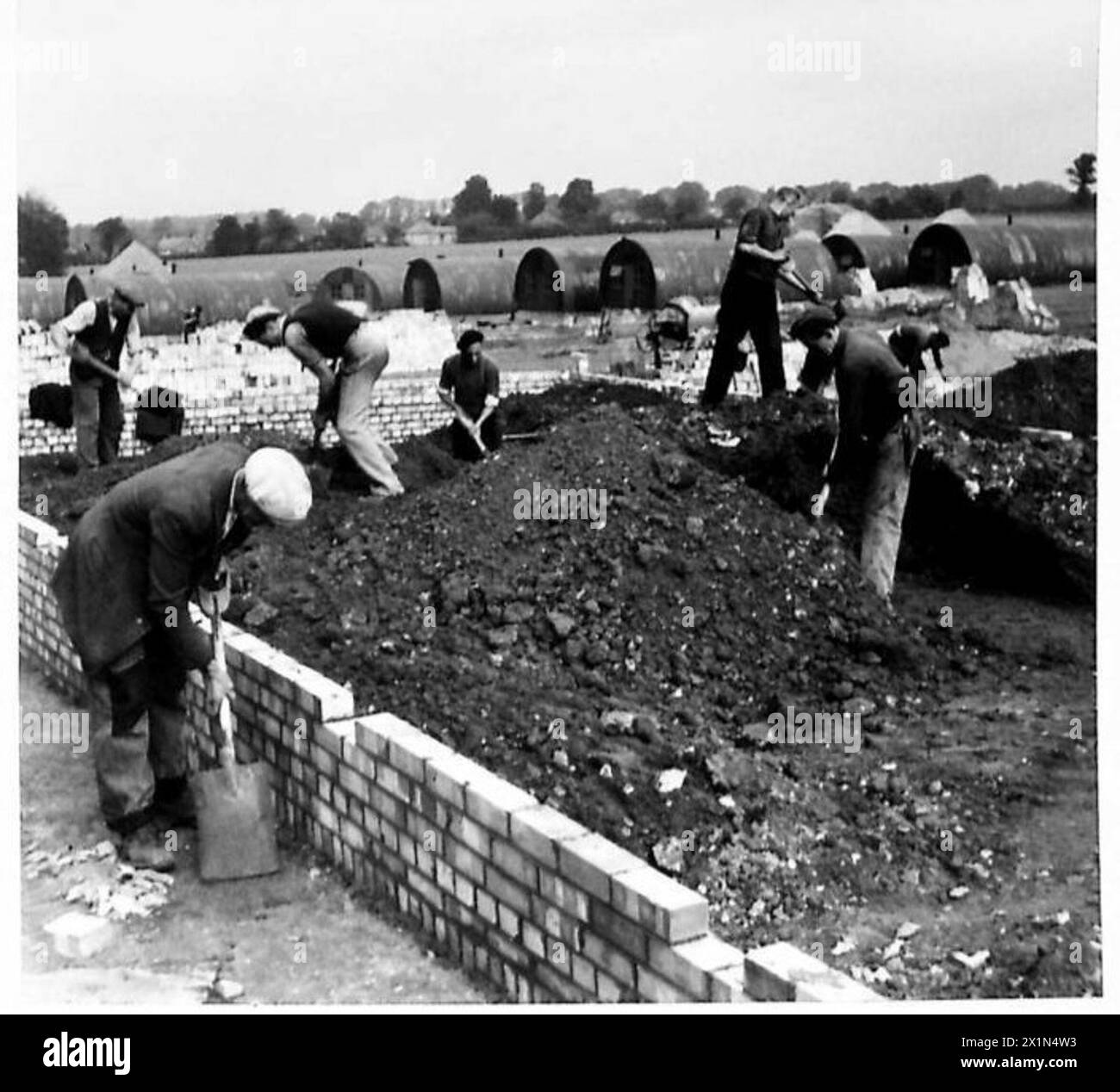 ANOTHER NEW ARMY CAMP - Levelling soil ready to receive concrete floor ...