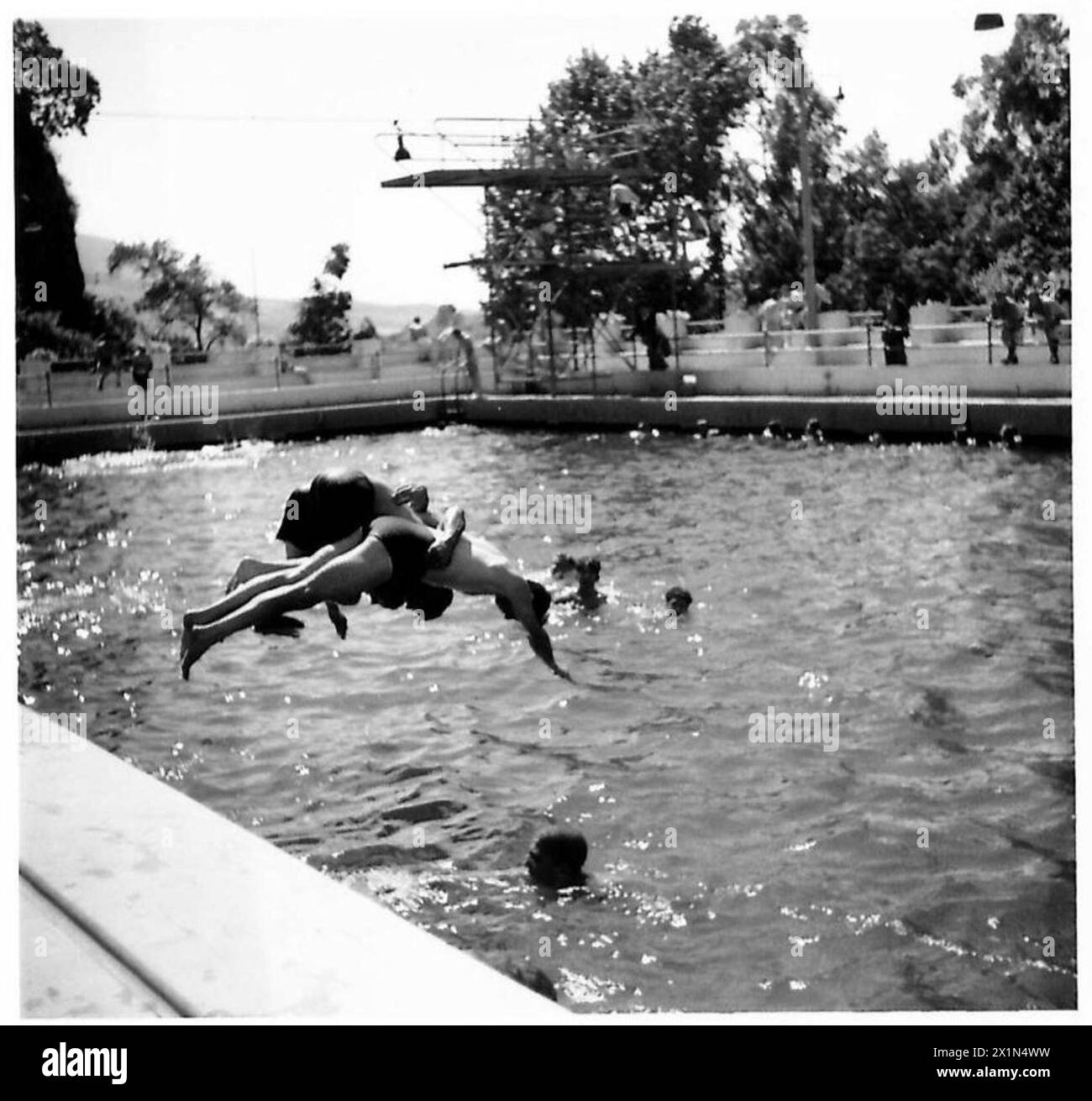 AT THE BATHING POOL - British troops get some well-earned pleasure at ...