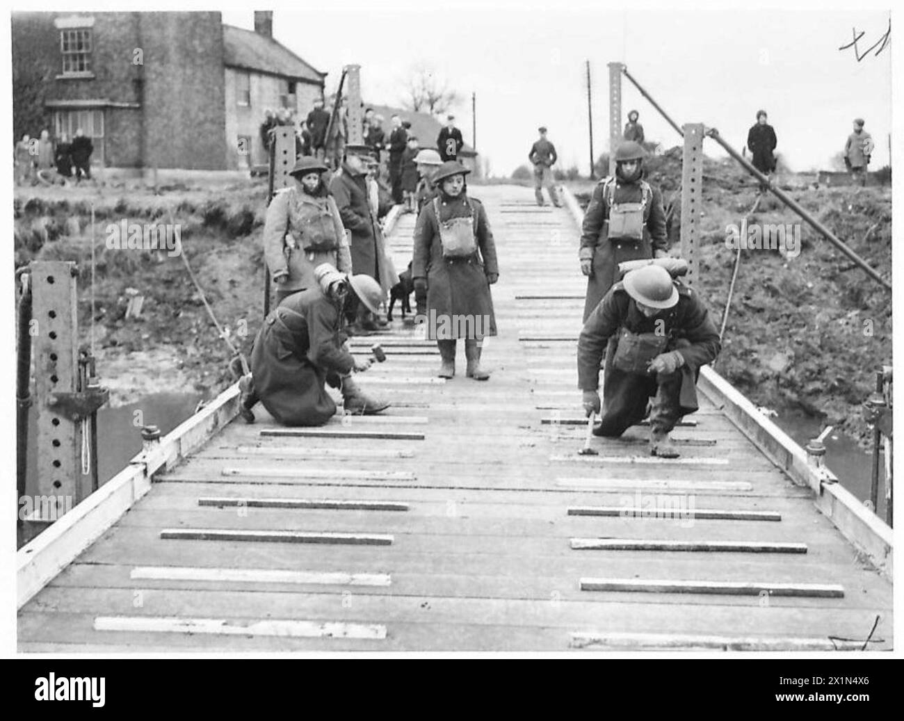 British Army sappers prepare a bridge approach during a Northern ...