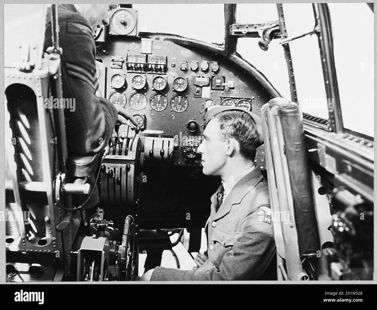 FLIGHT ENGINEERS IN TRAINING : - 12466 Picture (issued 1944) shows - A ...