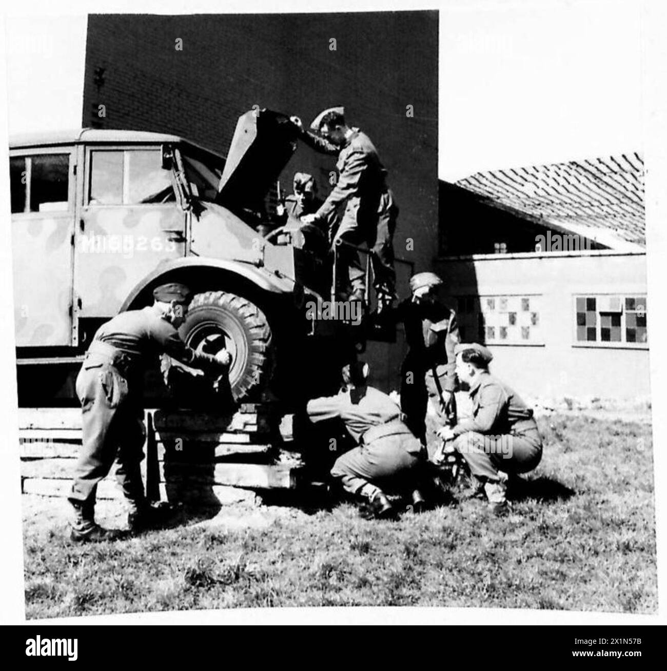 Army Film Unit cameramen receive instruction in vehicle and motorcycle ...
