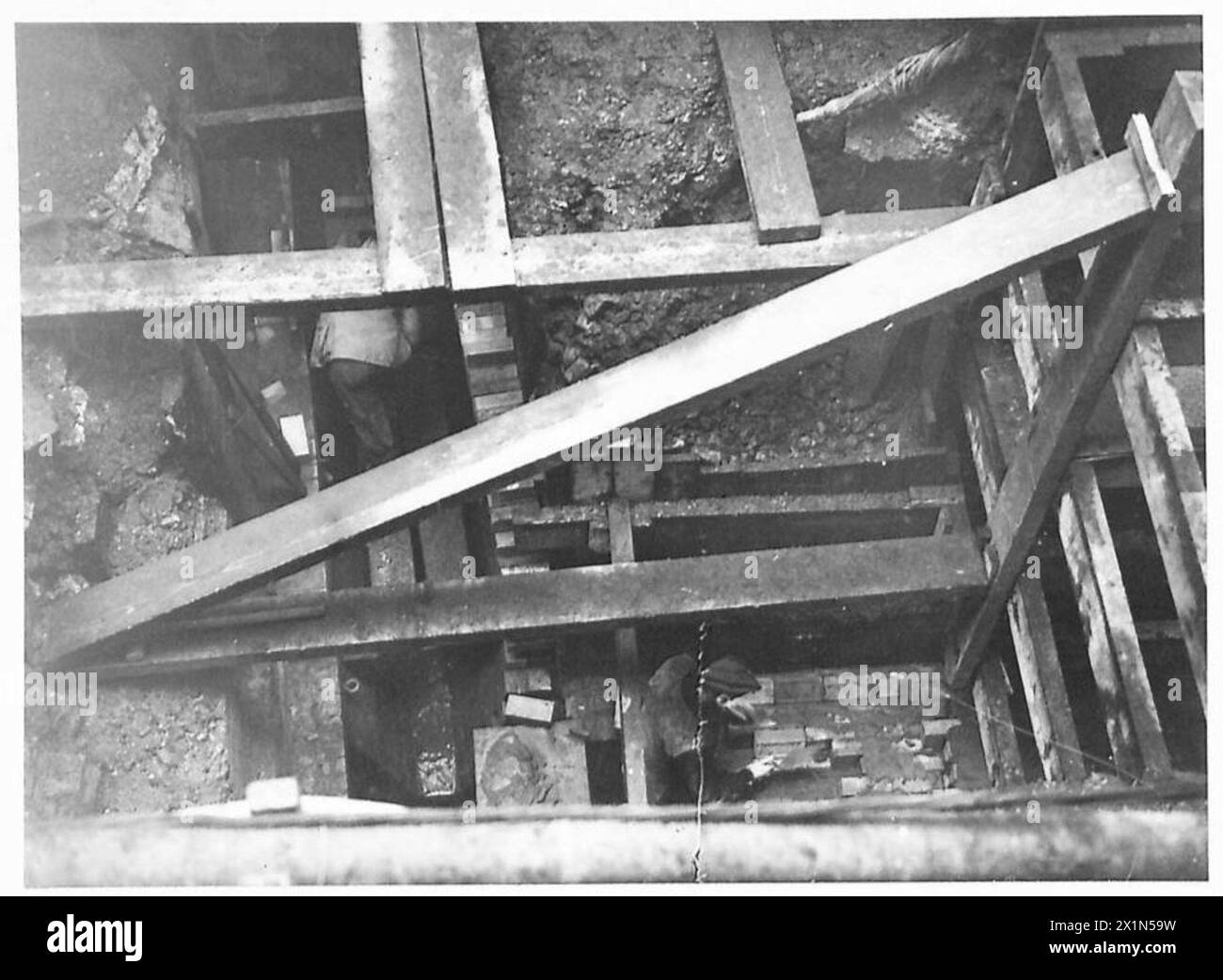 R.E.s CLEAR UP BOMB DAMAGE - This set of pictures show men of the Royal ...