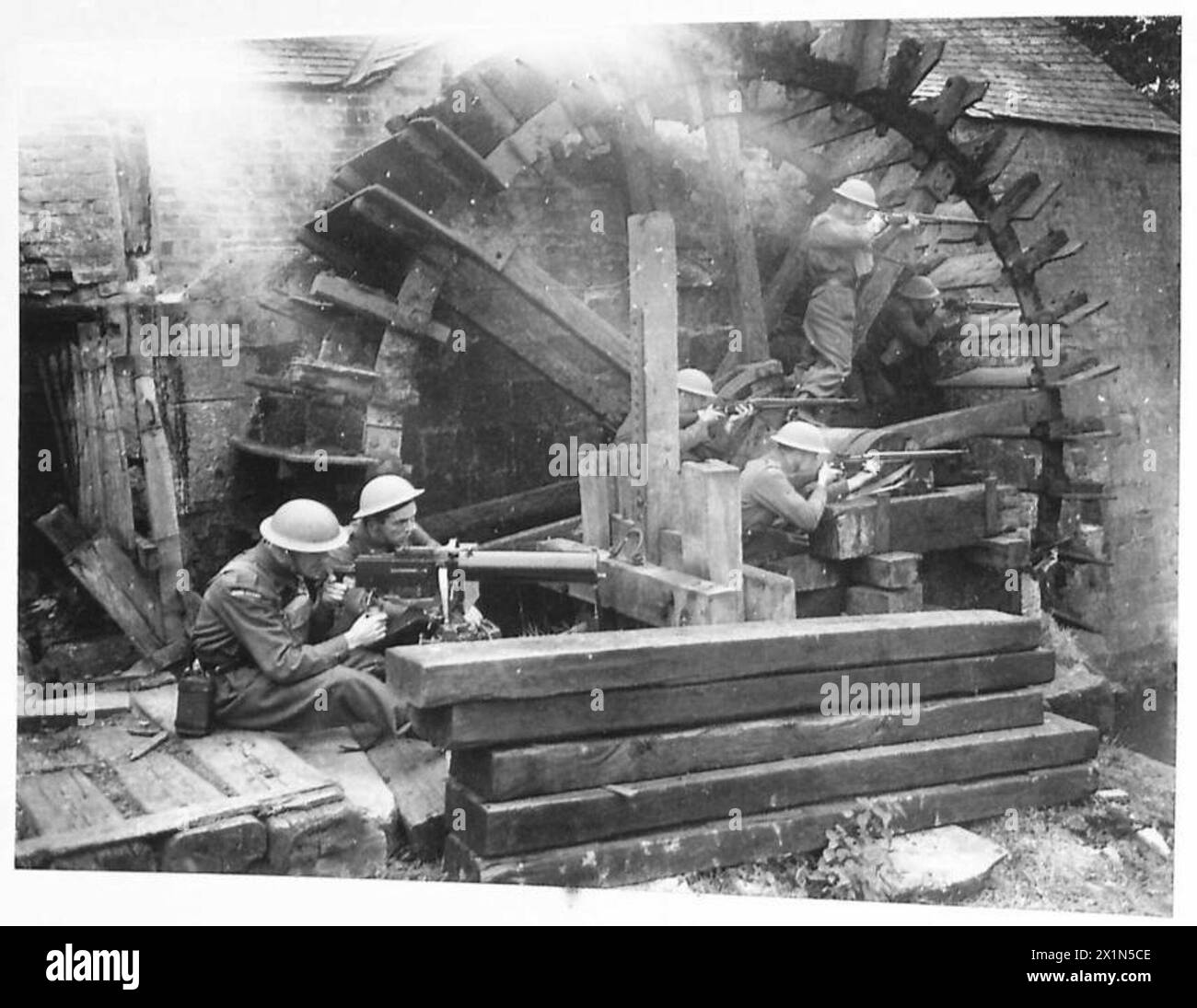 Home Guard defenders in the Western Command are positioned in the wheel ...