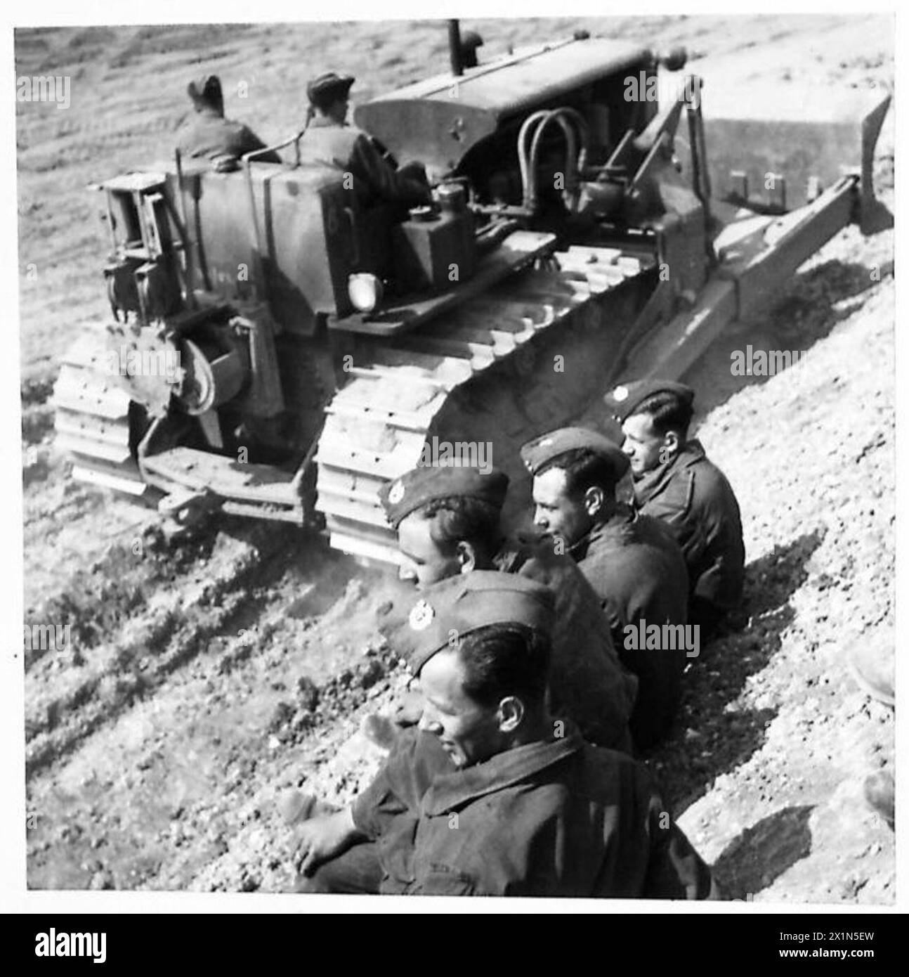 ARMY MOTOR TRACTOR SCHOOL - Bulldozers at work on the training ground ...