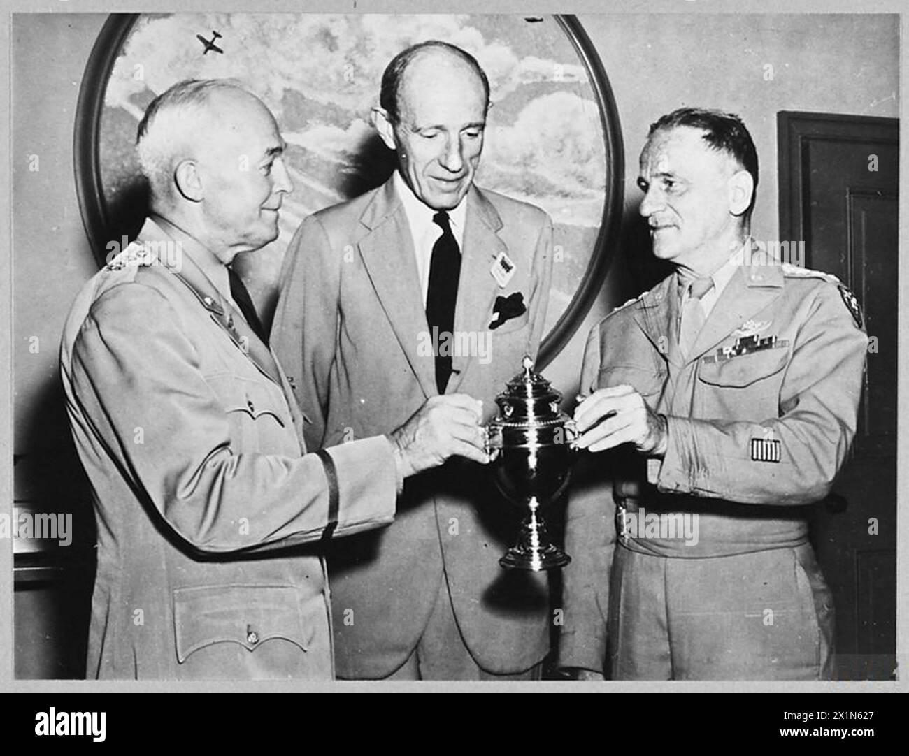 General Carl Spaatz accepts the RAF Gold Cup on behalf of the USAAF ...