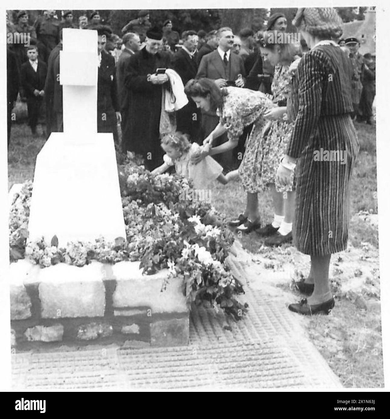 BASTILLE DAY IN NORMANDY - A young French girl, Collette Michel, lying ...