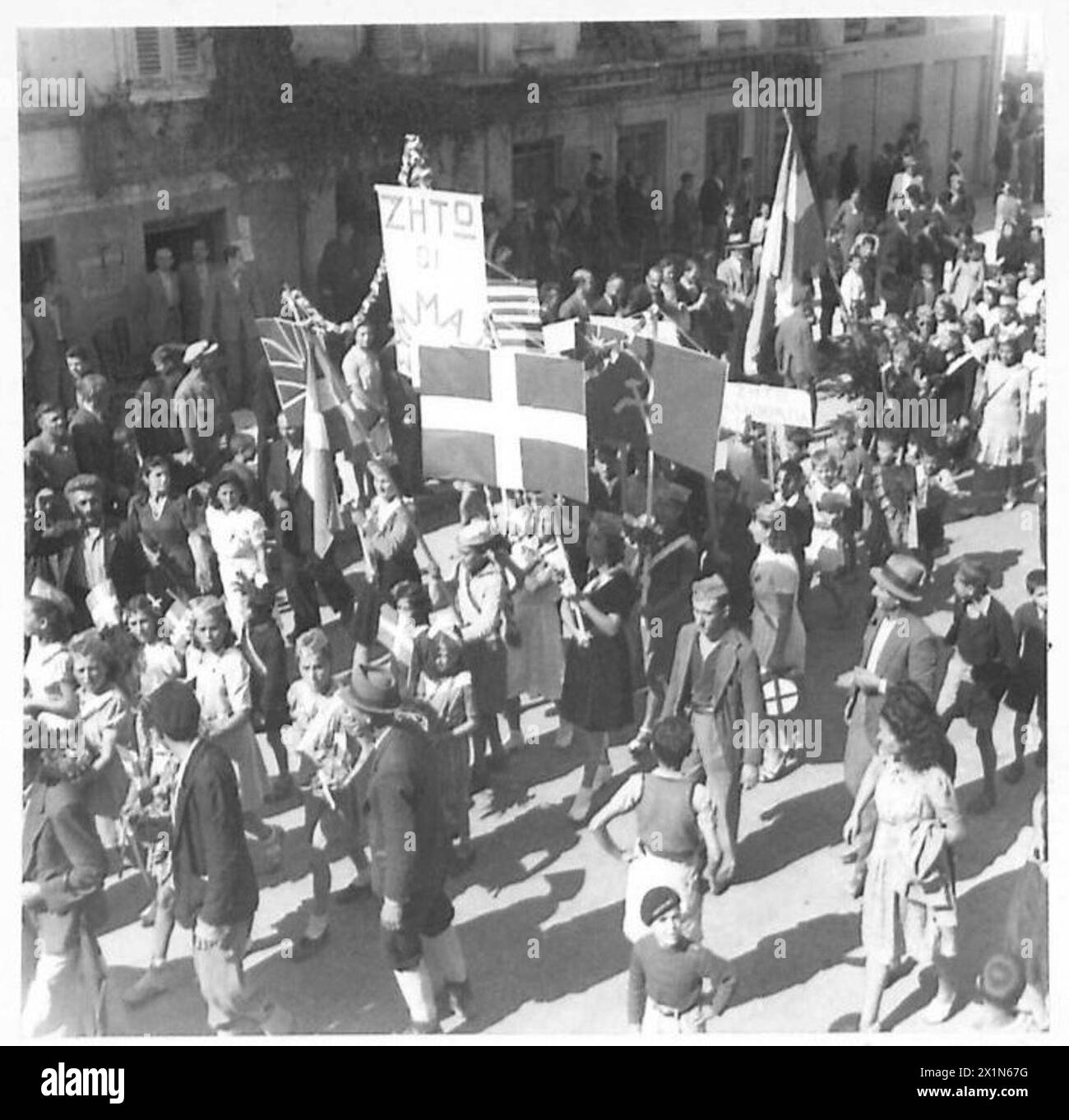 Procession with flags Cut Out Stock Images & Pictures - Alamy