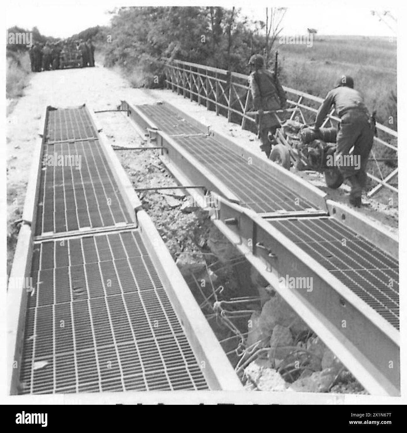 FIFTH ARMY JOINS WITH BRIDGEHEAD FORCES - The first signal wire is laid ...