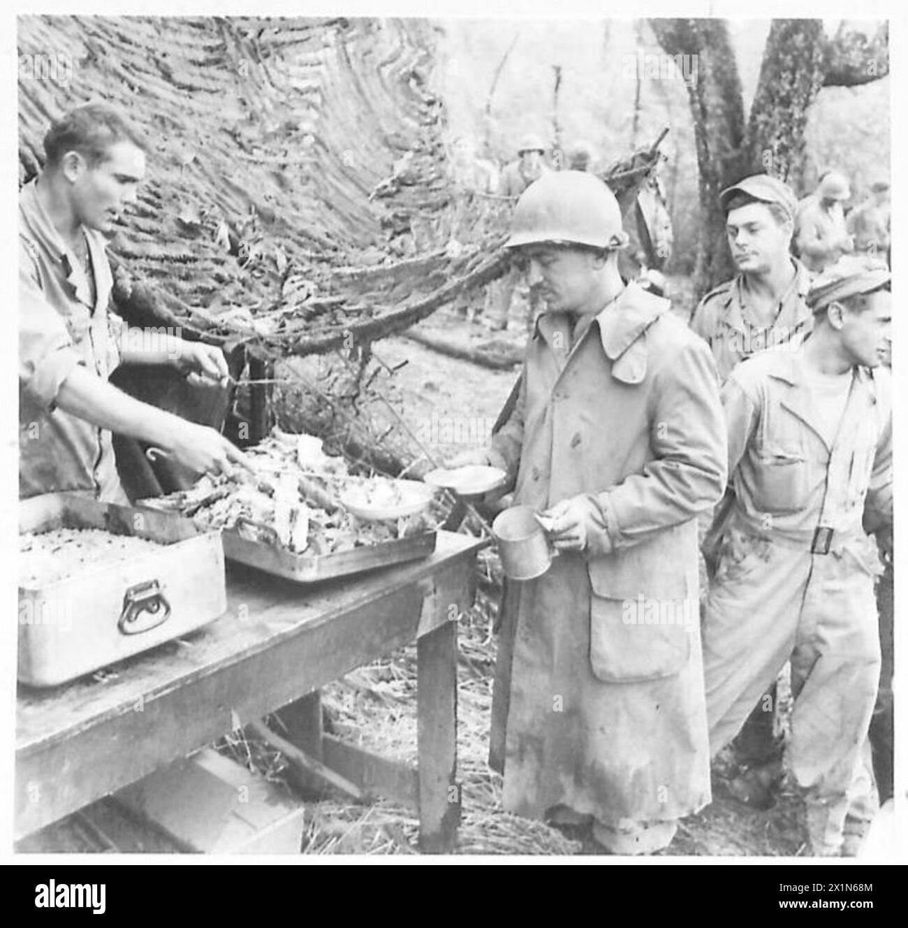 American troops in the Fifth Army sector of Italy line up for their ...
