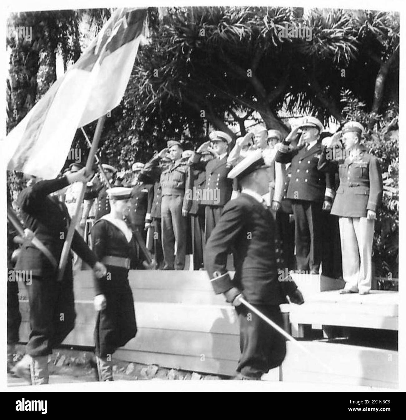 A British naval unit marches past the saluting base during the farewell ...