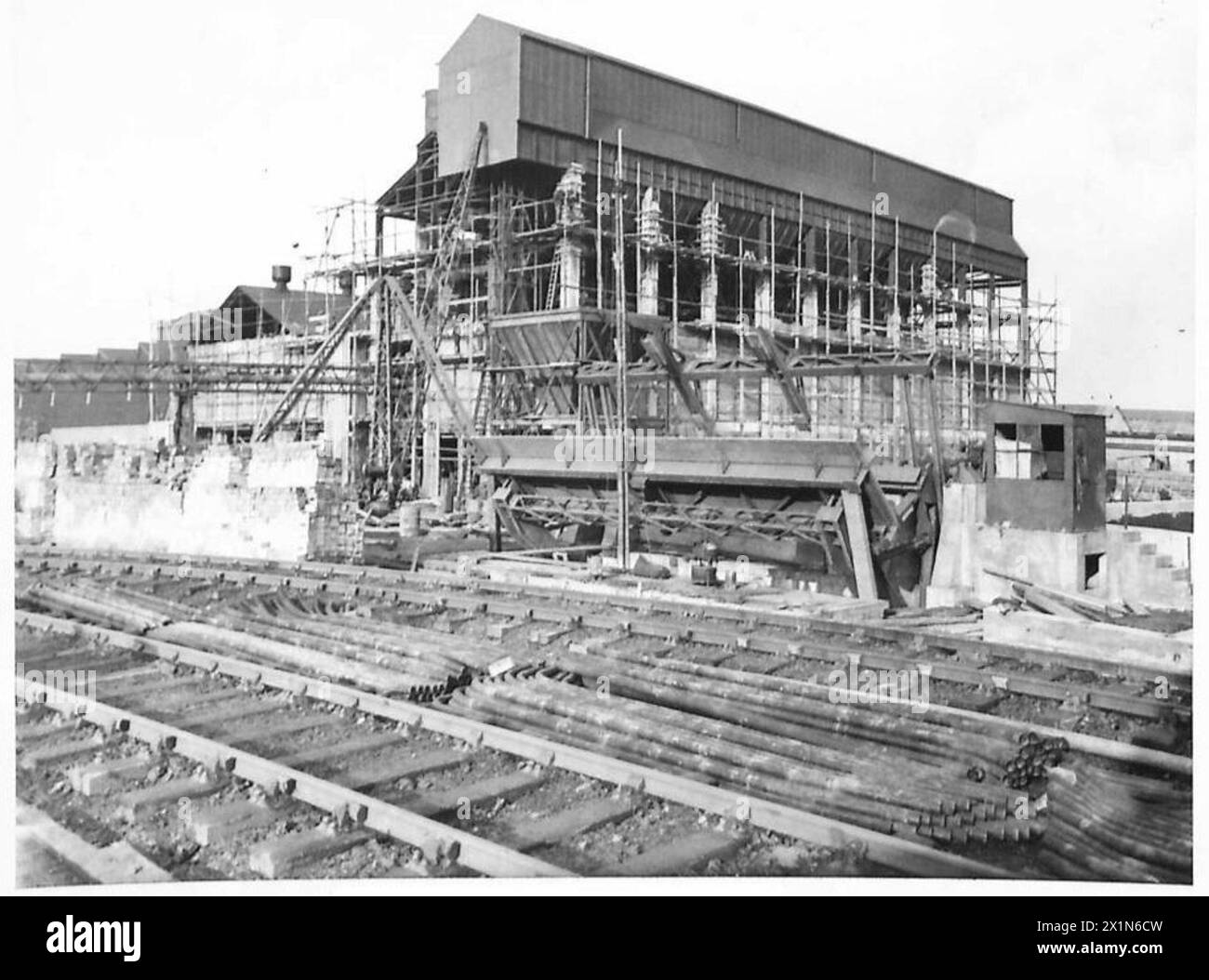 Photographs document the buildings of the Central Ordnance Depot at ...