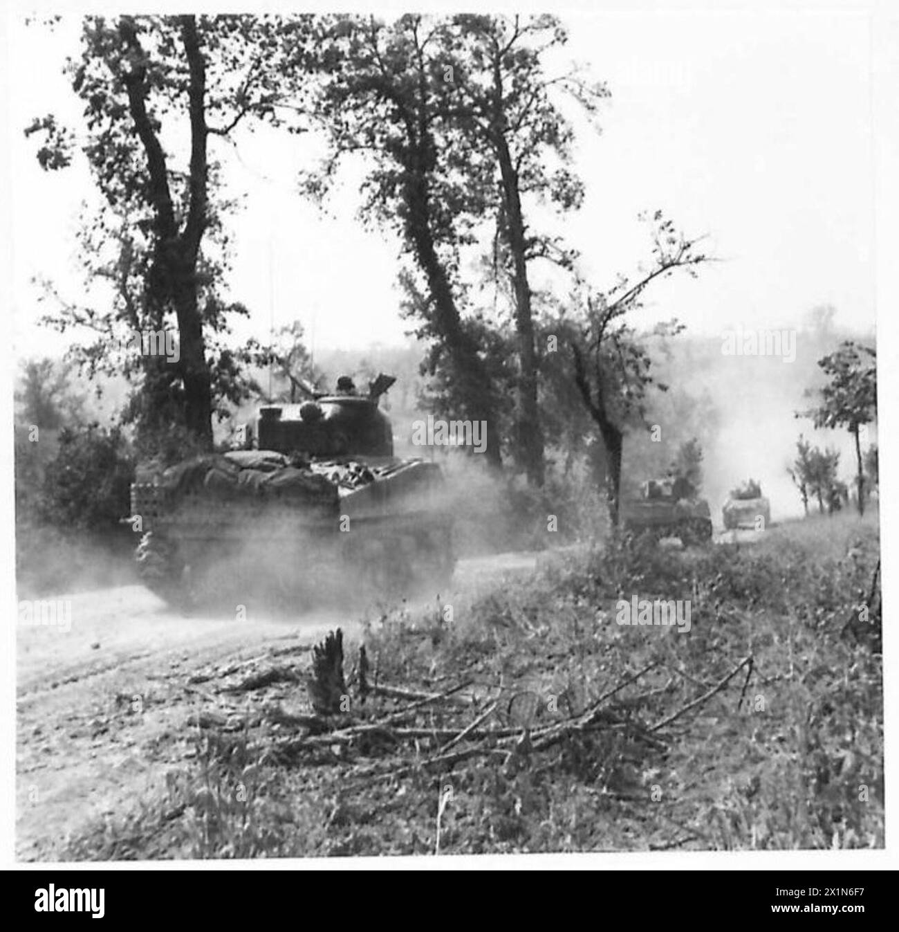 Sherman tanks infantry advance Black and White Stock Photos & Images ...