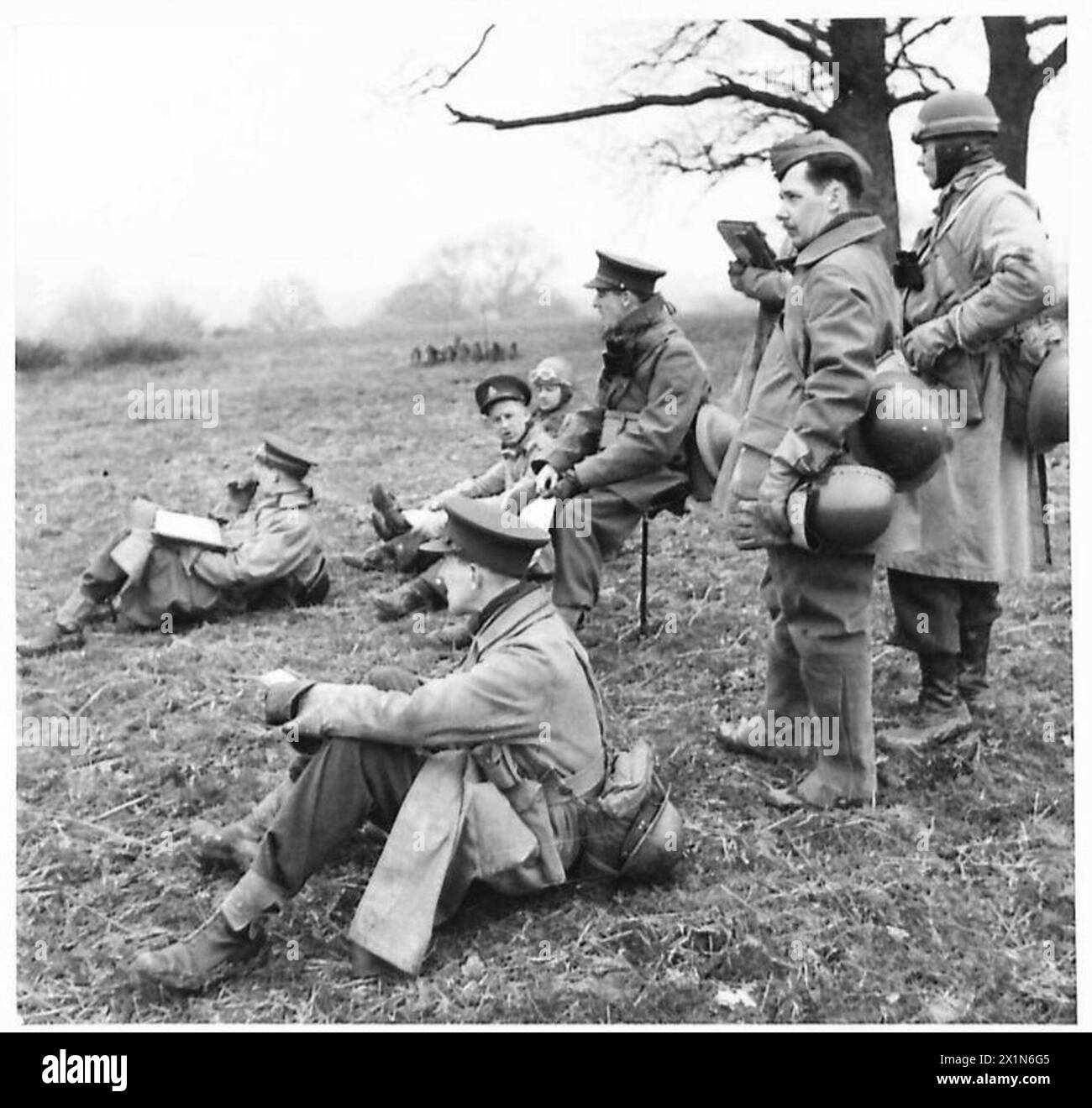 CANADIAN OFFICERS TOUR EASTERN COMMAND - Two of the groups discussing ...