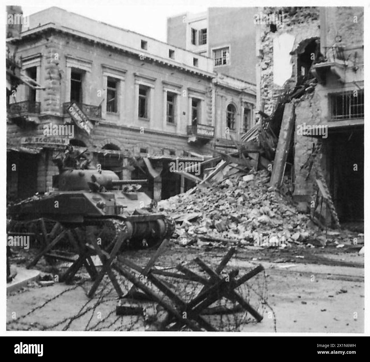 DEVASTATION IN ATHENS - One of the tanks which helped in the recovery ...