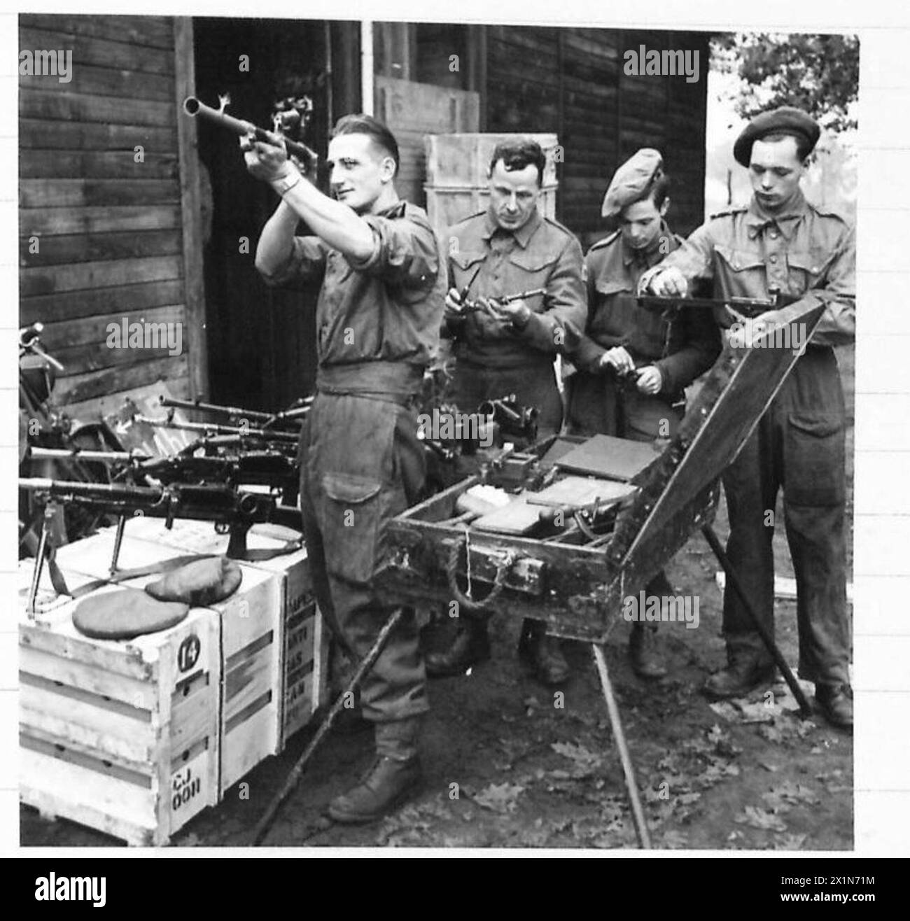 K.S.L.T. AT A REST CAMP - In the K.S.L.I. Armourers Shop as they ...