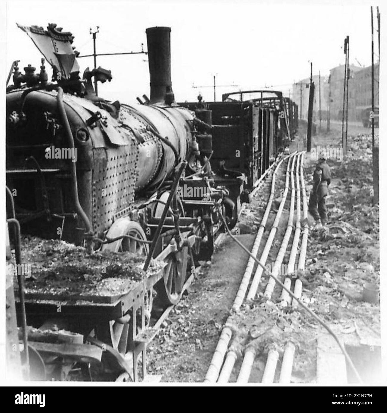 EIGHTH ARMY : LIFE BLOOD OF AN ARMY - The pipeline passes the wreckage ...