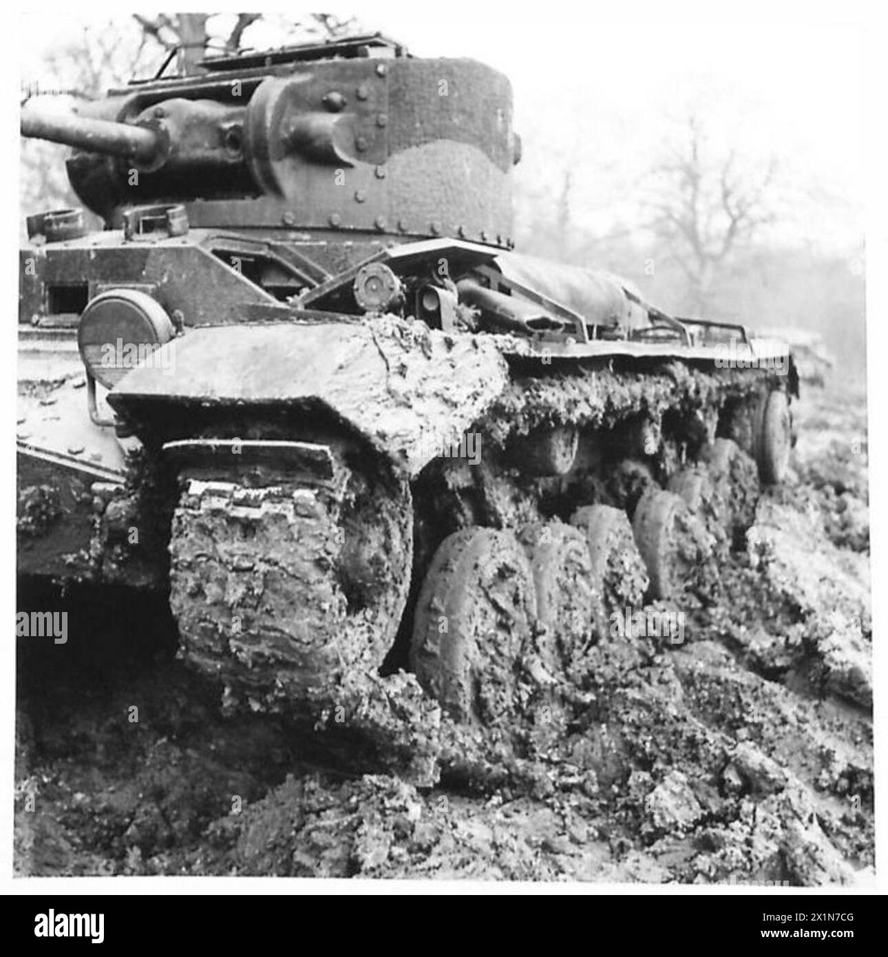 TESTING TANKS IN MUD - A Valentine tank towing a Cruiser Mk. IV through ...