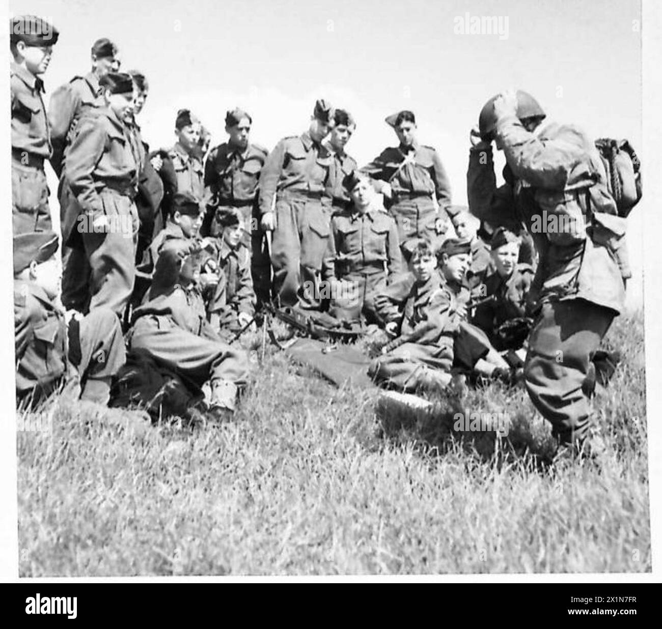 WILTSHIRE CADETS WATCH ARMY DEMONSTRATION - A paratroop shows the boys ...