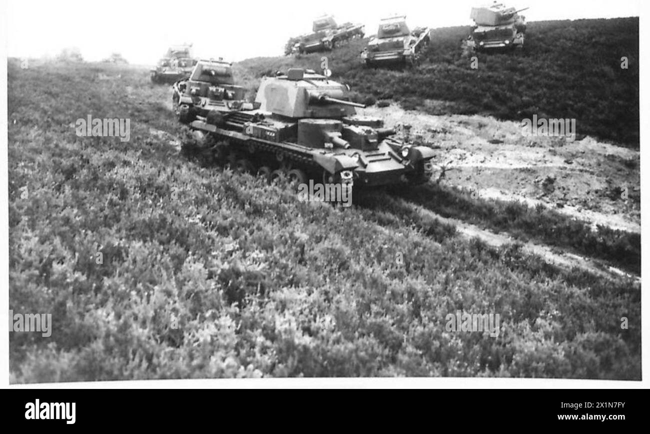 A DAY WITH THE ROYAL TANK REGIMENT - The tanks deploying into line as ...