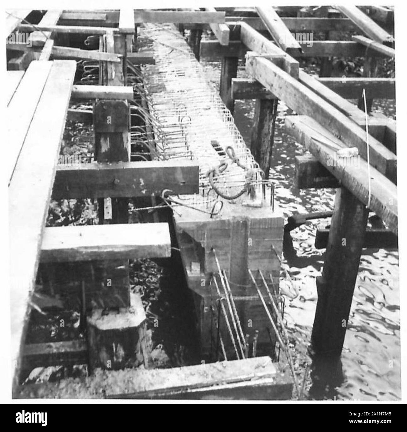 British Army engineers construct a retaining wall as part of port ...