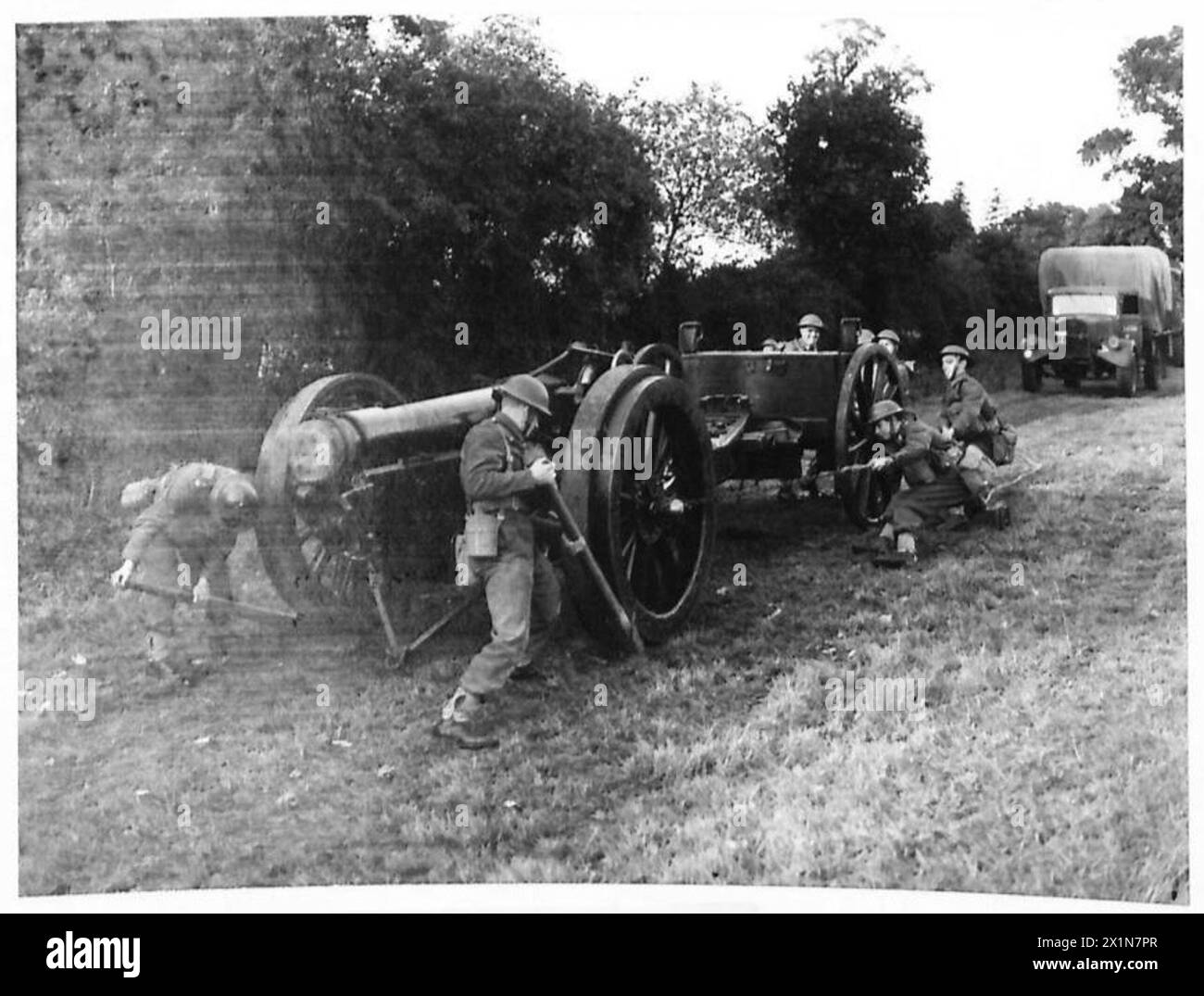 A British Army artillery gun is moved into position and prepared for ...