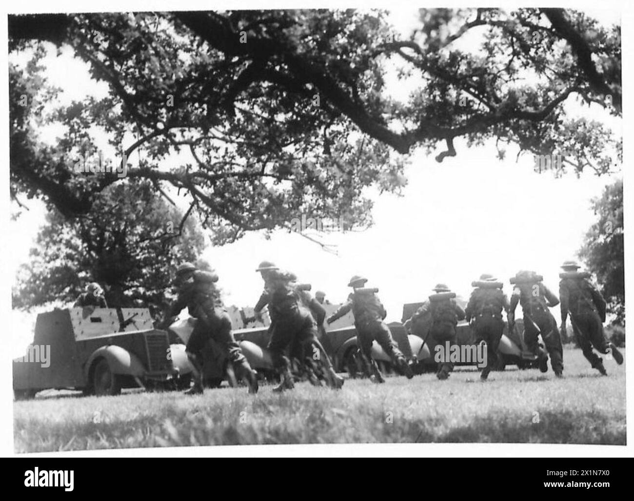 Crews of the British Army rushed to their armoured cars during a ...