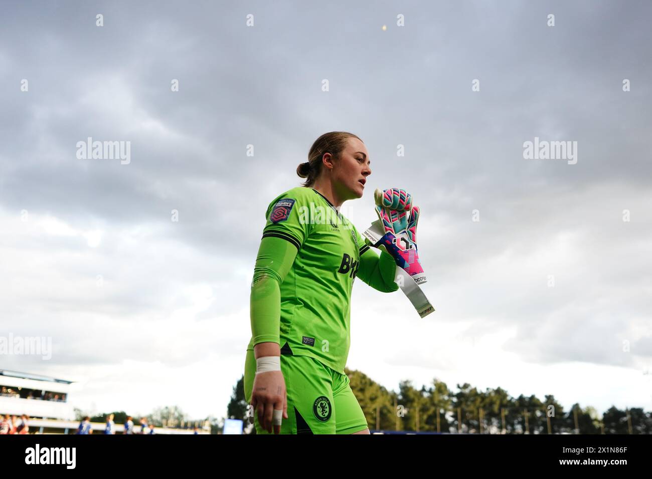 Aston Villa goalkeeper Anna Leat leaves the pitch after being sent off ...
