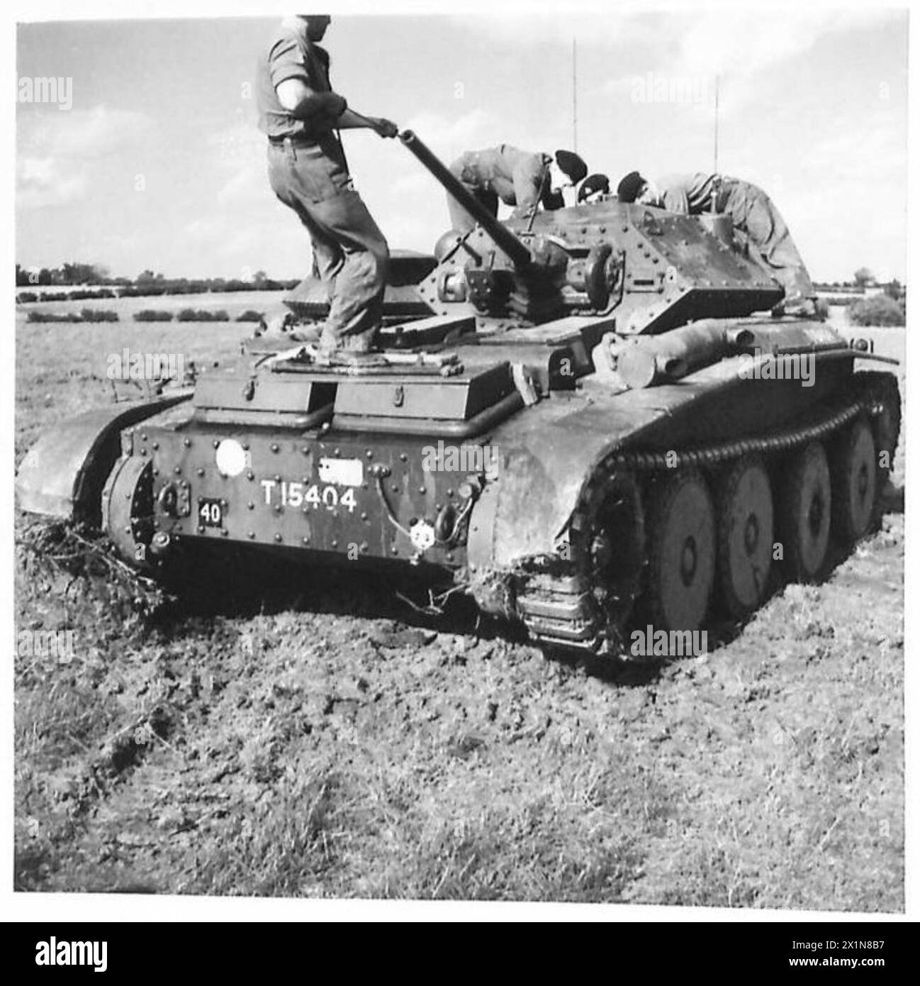 Members of a British Armoured Division overhaul and repair a Covenanter ...