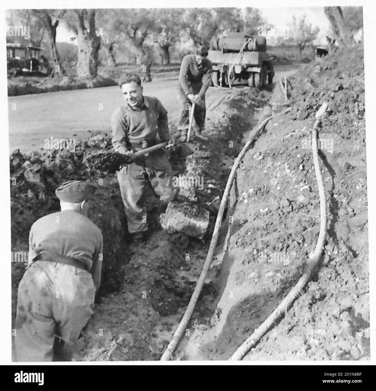 In Italy, Fifth Army linemen of a special line construction company ...