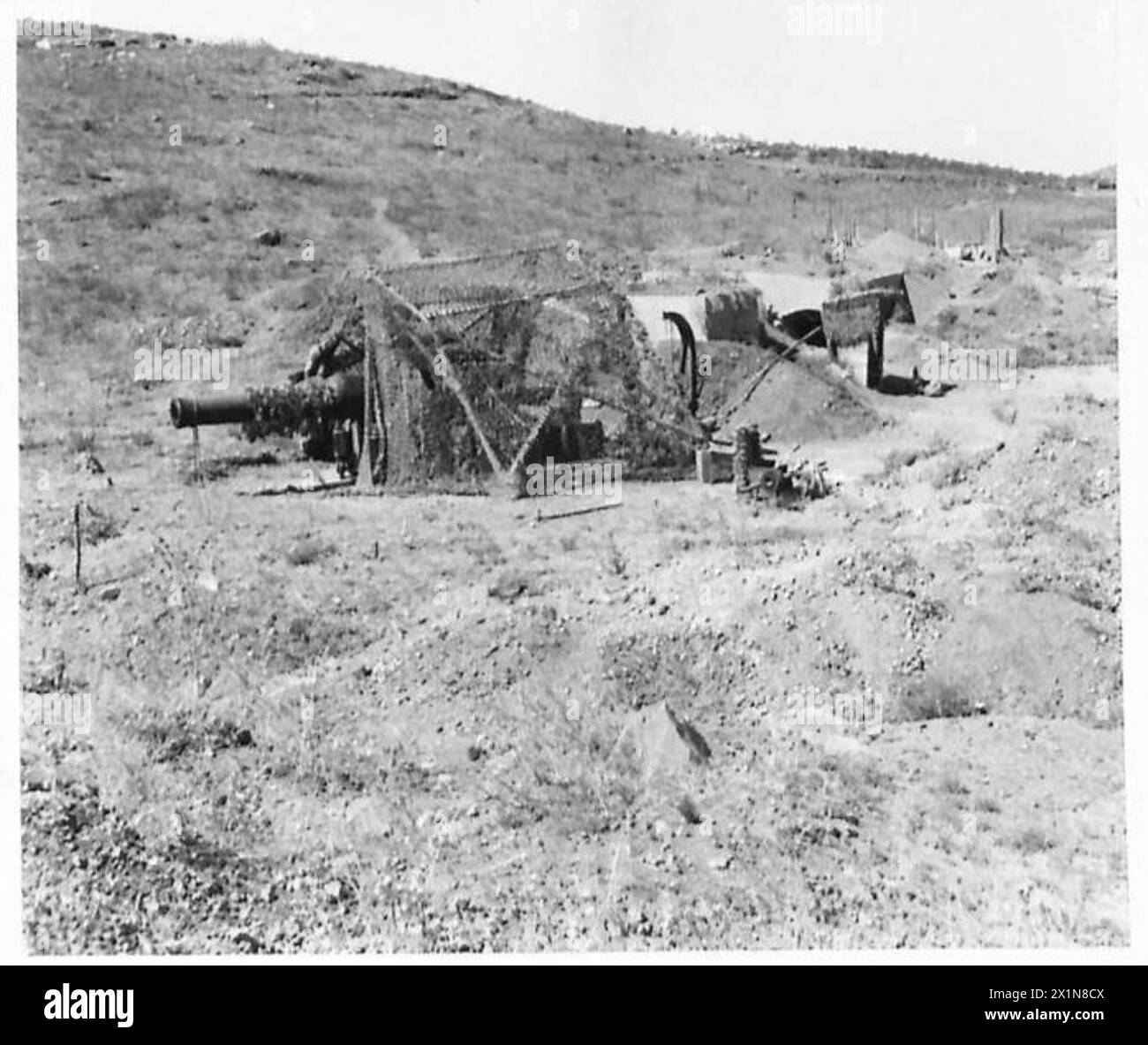 CAPTURE COASTAL GUNS GORNALUNGA, NEAR GATANIA - One of the captured gun ...