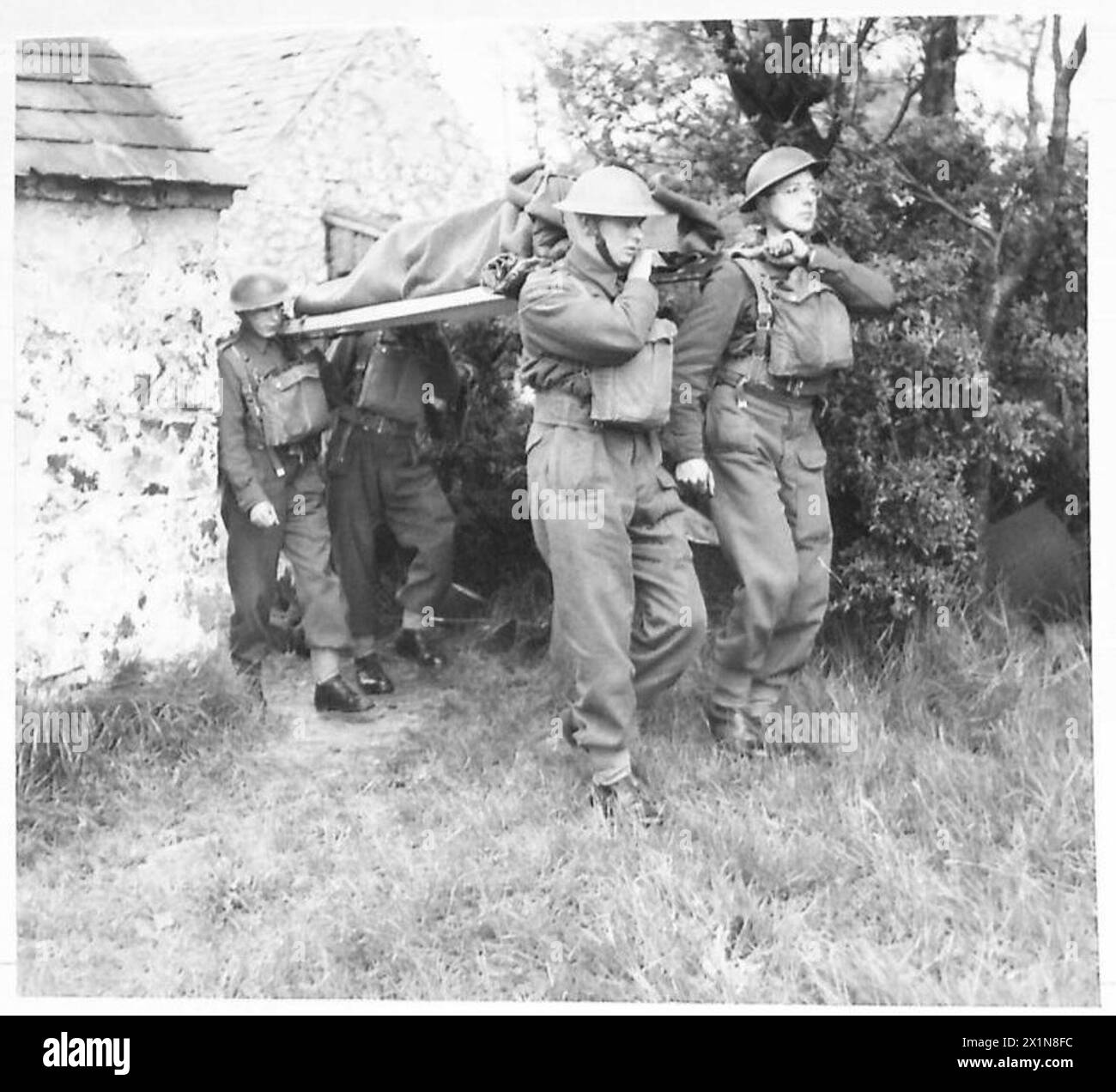 Stretcher bearers of the 206 Field Ambulance carry wounded soldiers ...