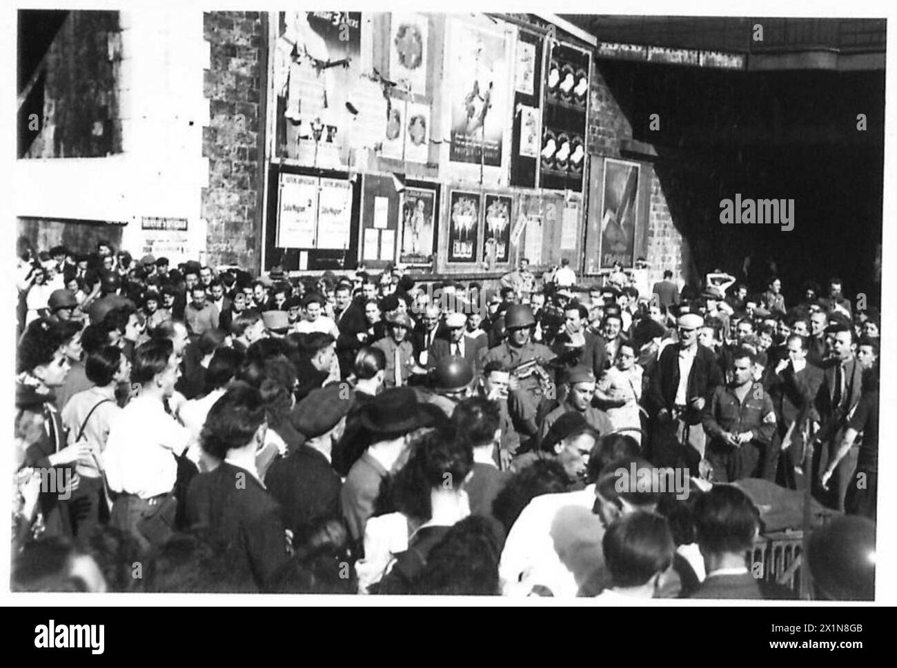 PARIS CROWDS JEER GERMAN PRISONERS - These photographs show German ...