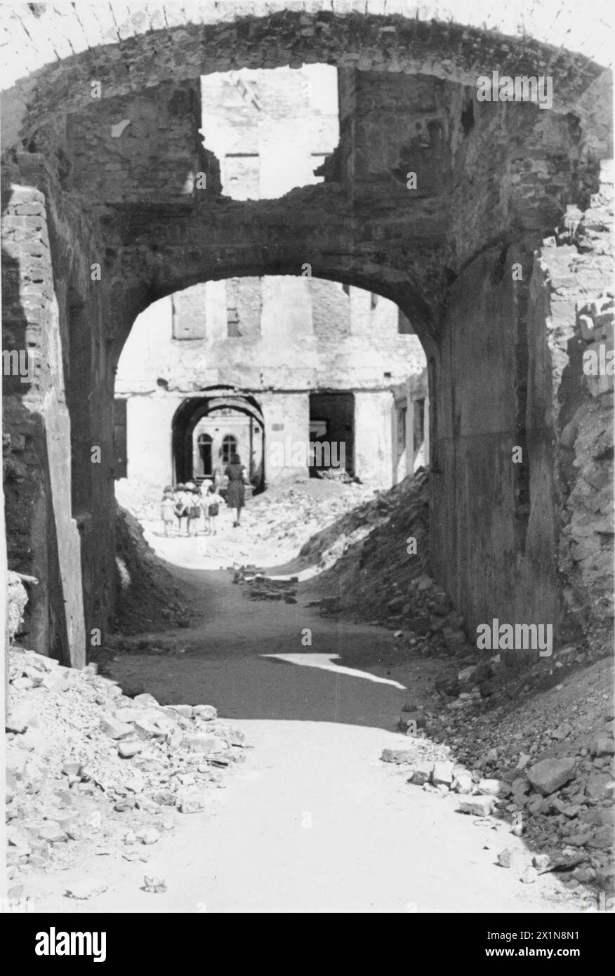 THE WARSAW GHETTO, OCTOBER 1940-MAY 1943 - A woman leading a group of ...