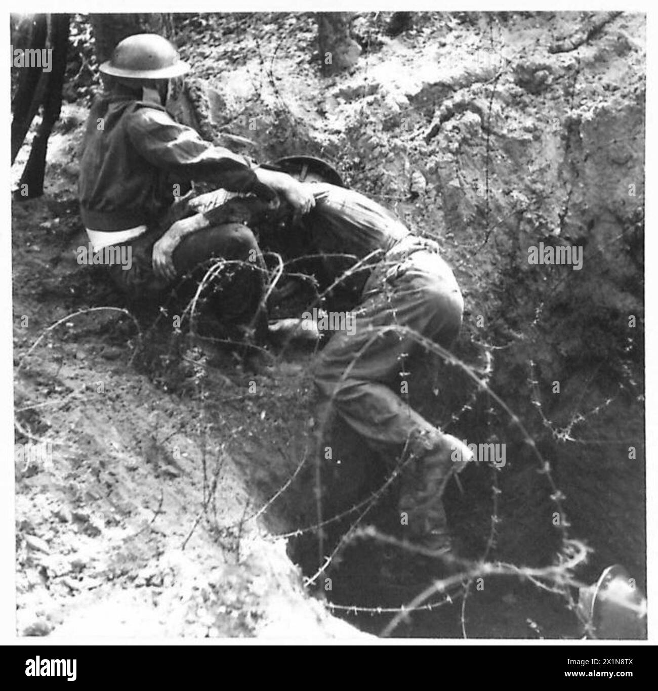 SCHOOL OF BATTLE DRILL - Assisting one another out of a ten foot pit ...