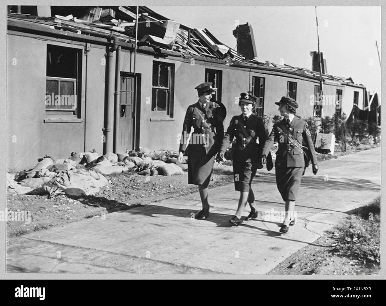 W.A.A.F. UNDER FIRE : DECORATED - [1549] Left to right - Sergeant Joan ...