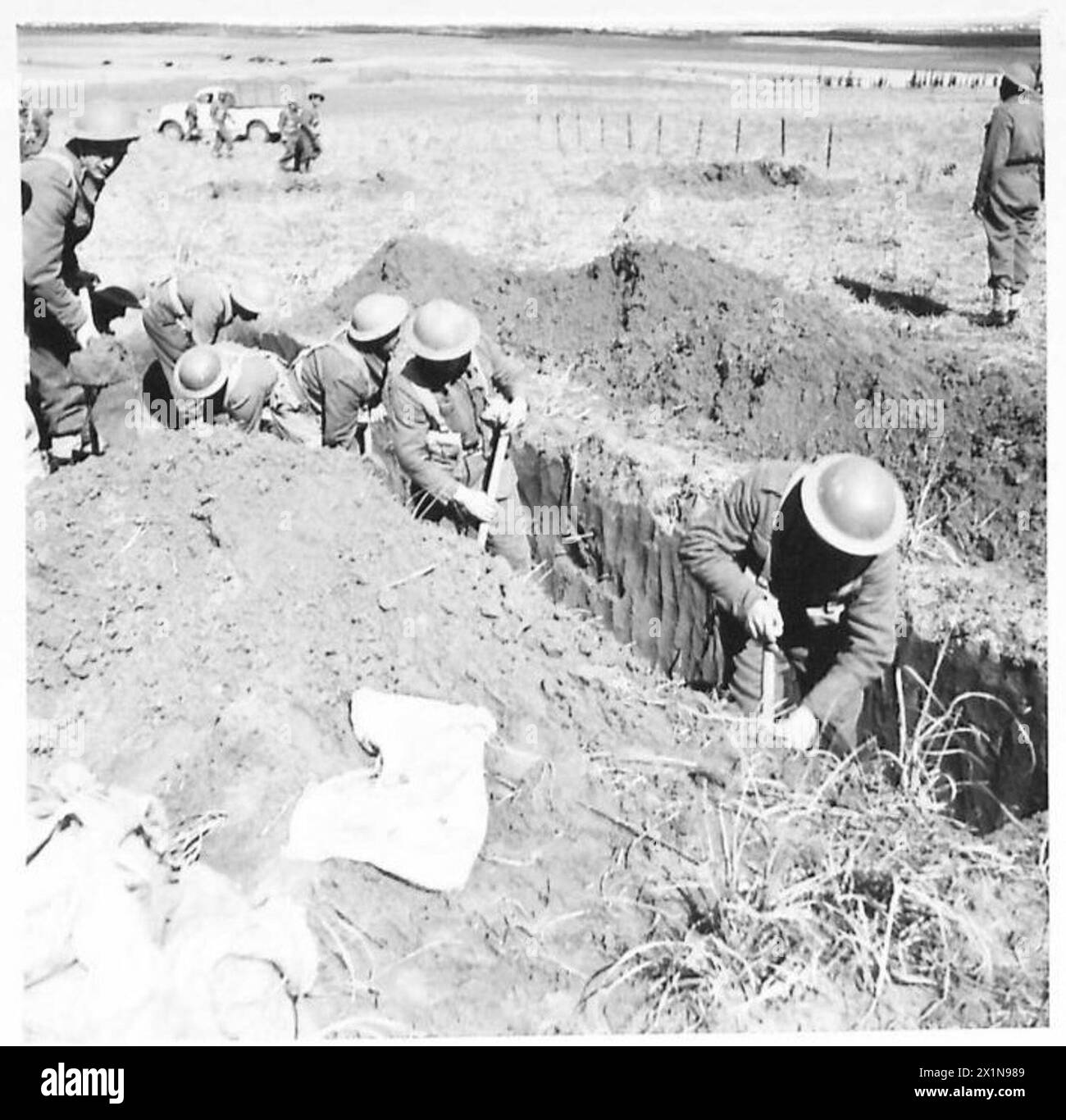 Digging trenches Cut Out Stock Images & Pictures - Alamy