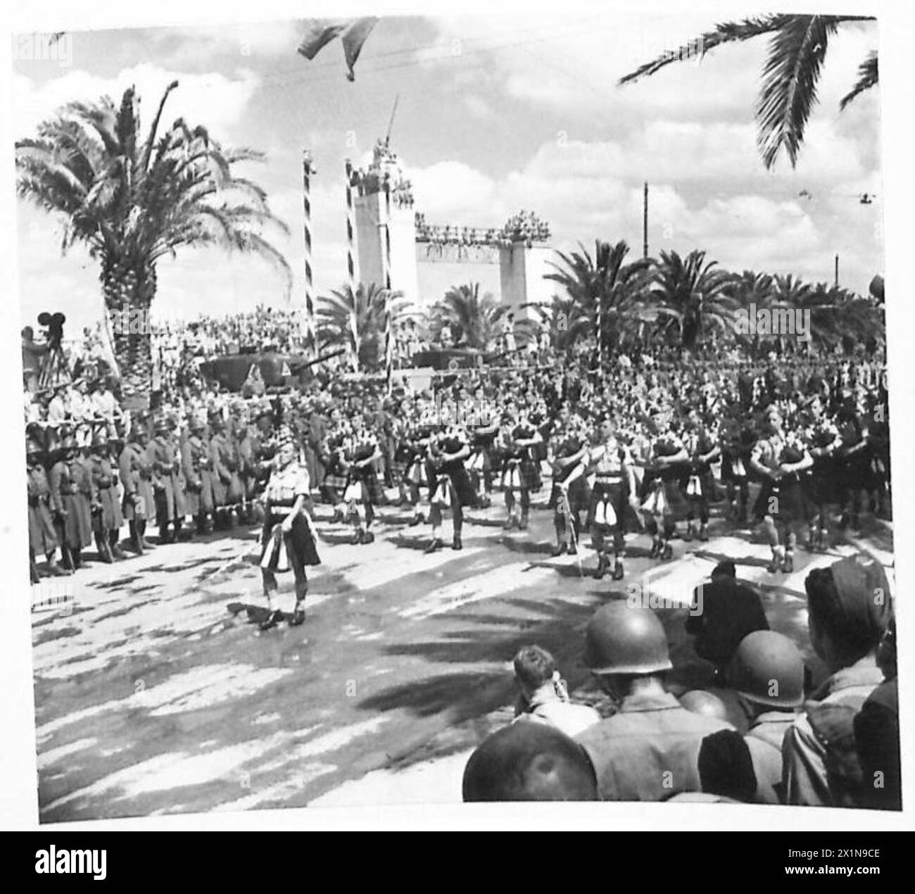 Pipers of the 51st Highland Division participate in a victory ...