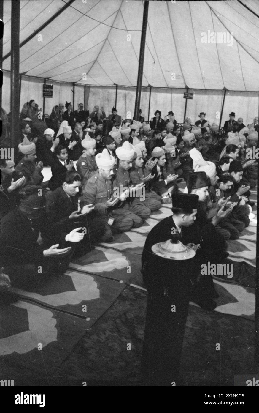 Muslims in Britain pray in a large tent outside Woking Mosque during ...