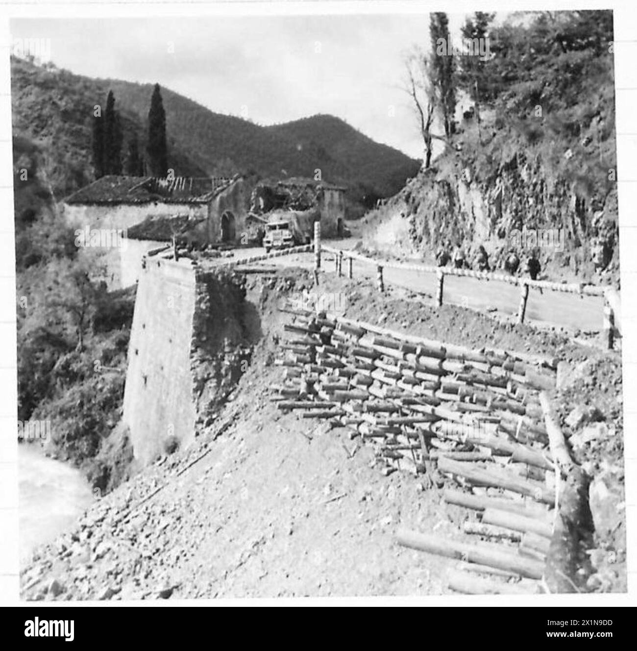 GERMAN DEMOLITIONS IN ITALY - Two views of timber cribbing on Route 67 ...