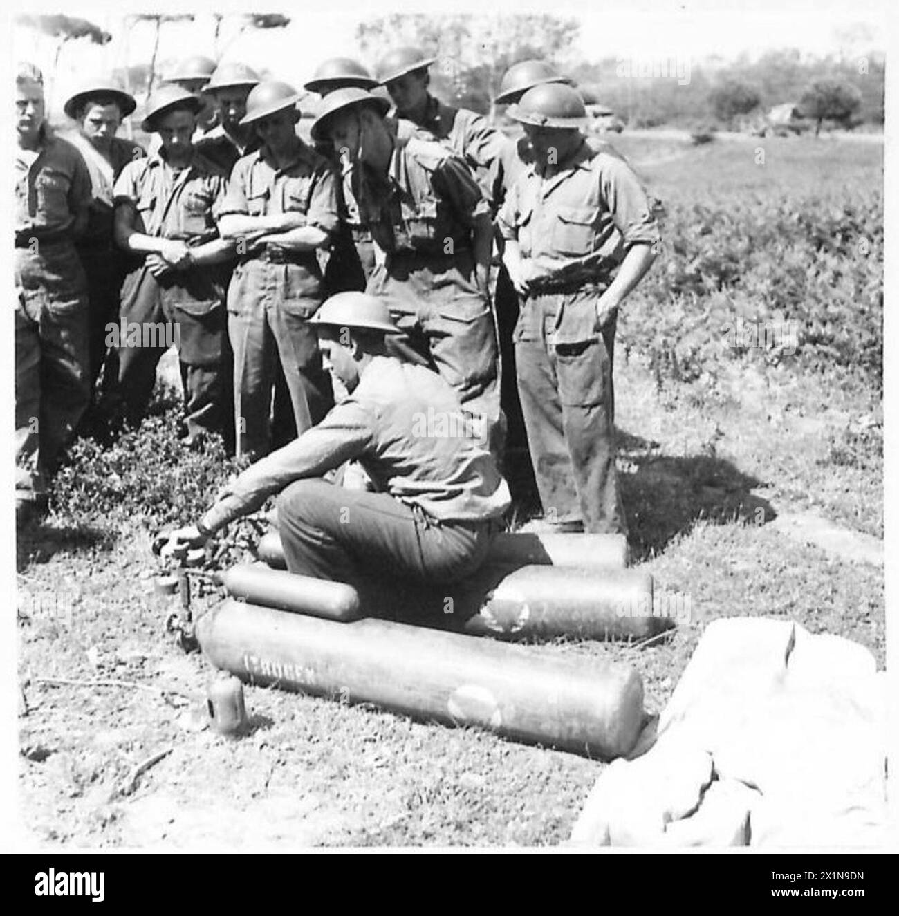 BRITISH USE AMERICAN PORTABLE FLAME-THROWER - Lieut. Popplewell of ...