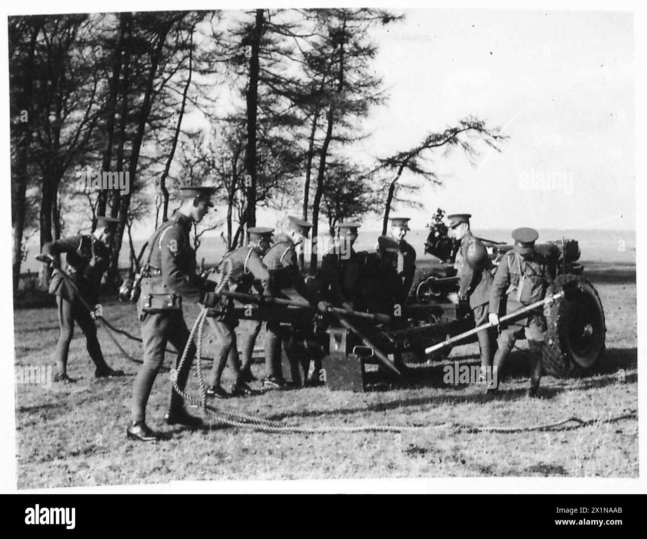 R.A. EXERCISES AT LARK HILL - 6" Howitzer limbering up, British Army ...